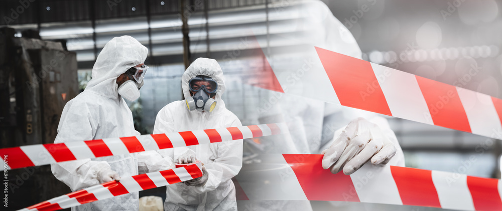 Workers wear protection suit checking chemical contaminated oil in old ...