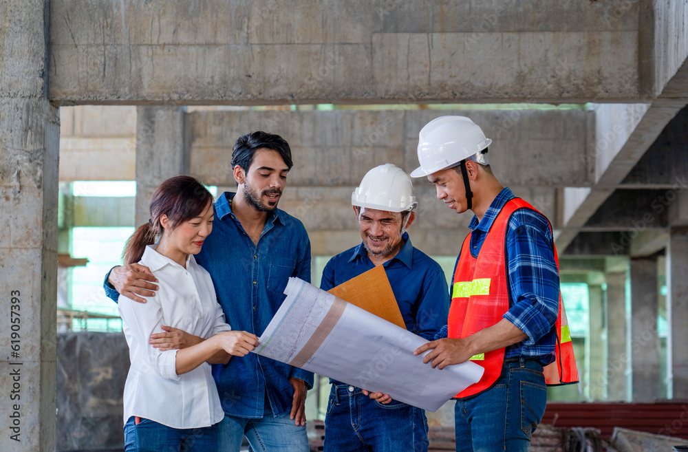 engineer foreman architect showing blueprint of house design to young ...