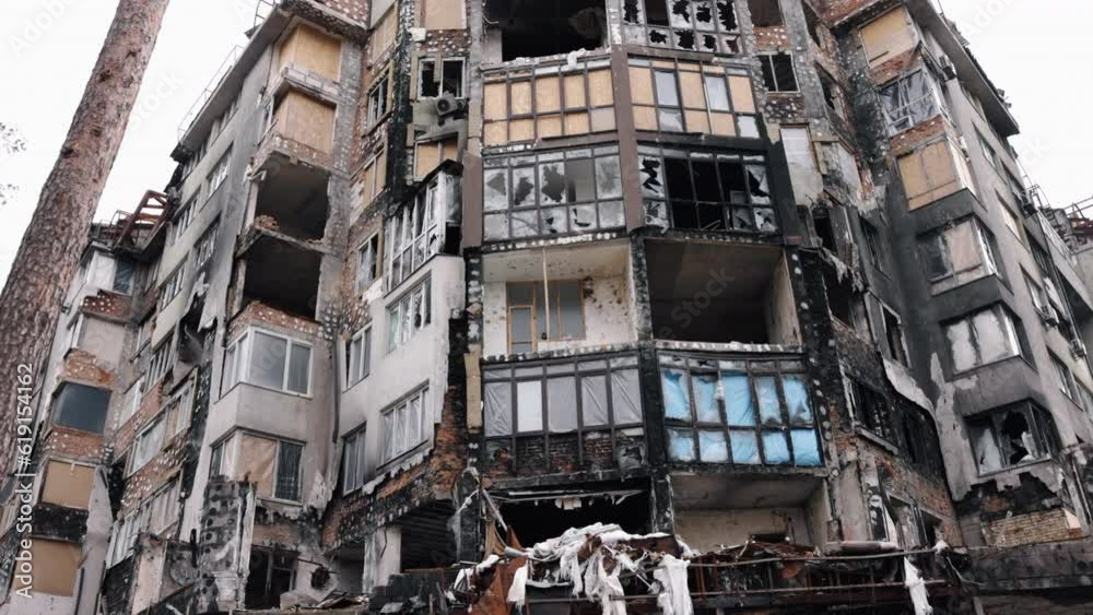 War zone, Burnt building, Inferno destruction. After rocket hit ...