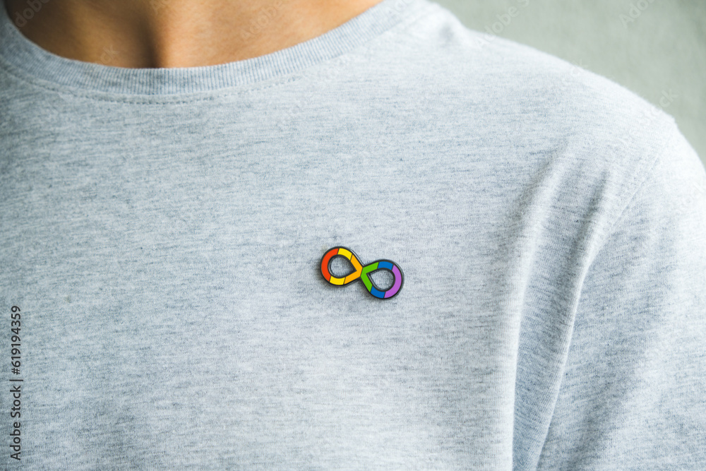 Teenage boy with autism infinity rainbow symbol sign metallic pin ...