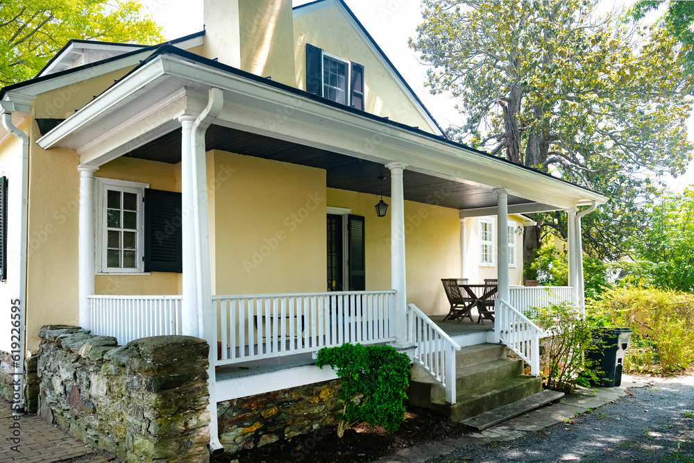 American single-story house. Traditional American-style home with ...