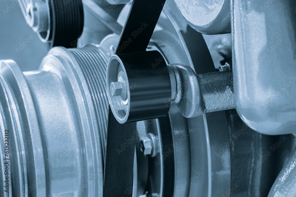 Belt drive of Diesel engine electric generator. Close up car timing ...