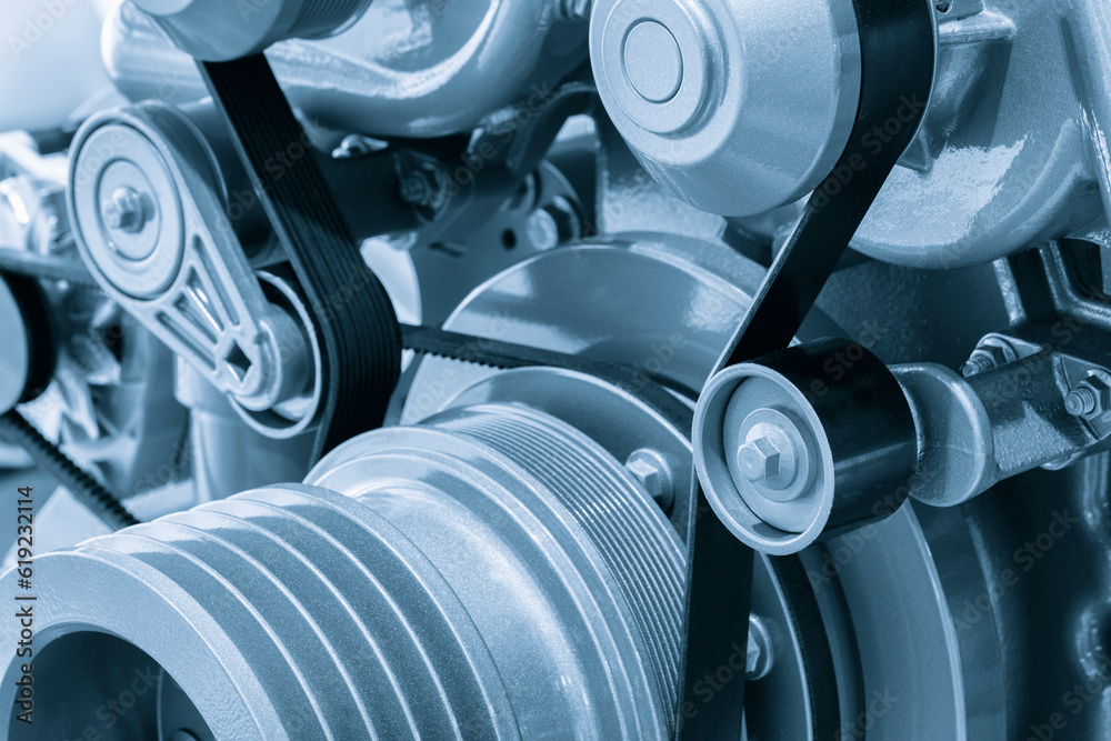 Belt drive of Diesel engine electric generator. Close up car timing ...