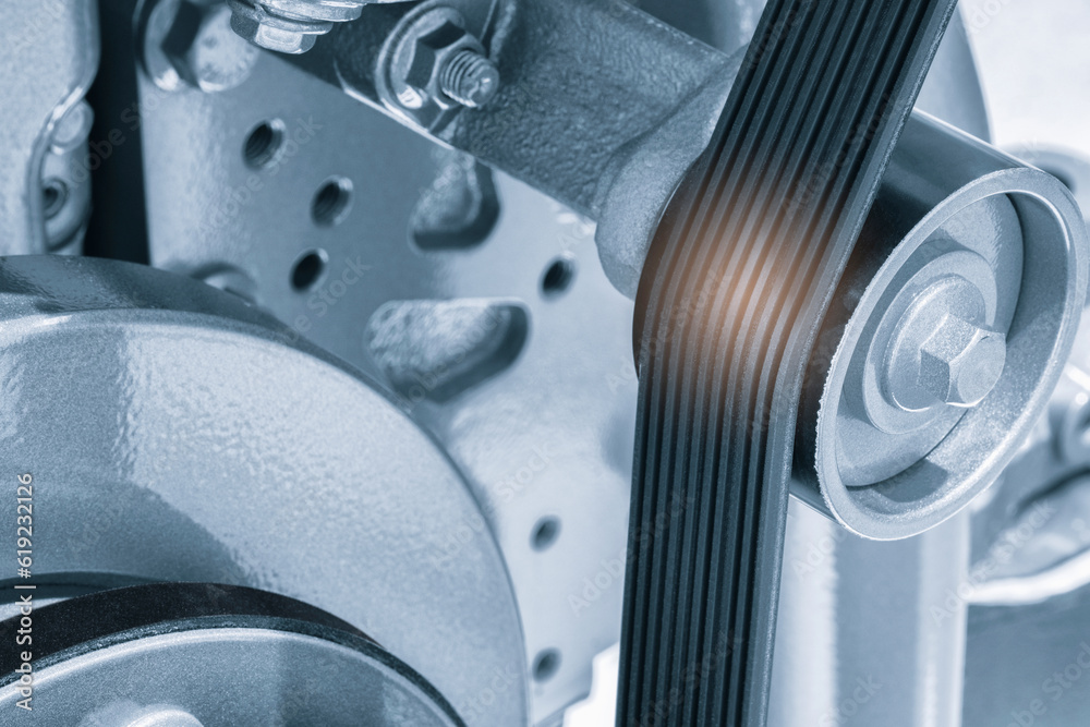 Belt drive of Diesel engine electric generator. Close up car timing ...