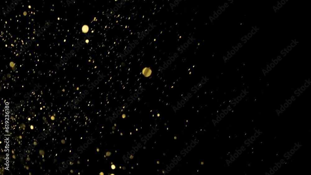 golden waves motion abstract of particles gold dust with stars on black ...