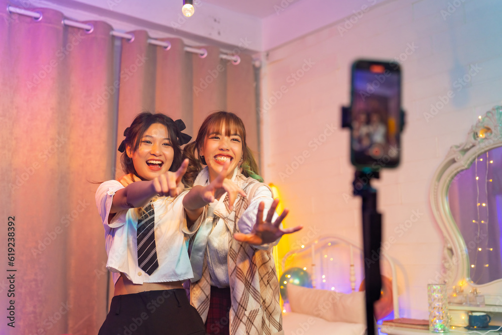 Happy Asian generation z woman friends vlogger influencer content ...