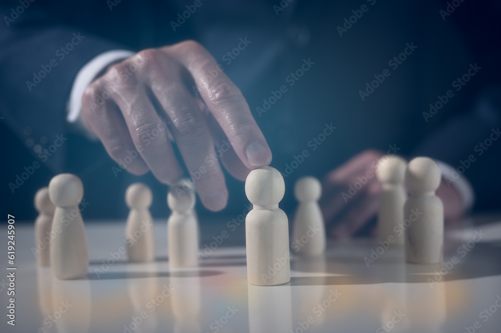 Human resource management concept.HR manager hand or Employer chooses ...