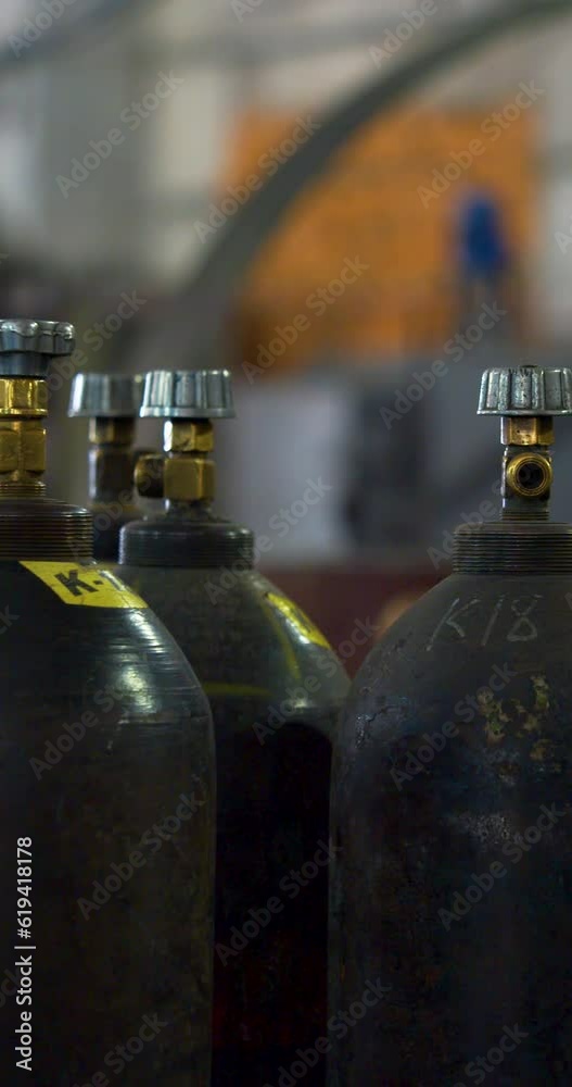 Oxygen cylinder with compressed gas. Black oxygen cylinders for welding ...