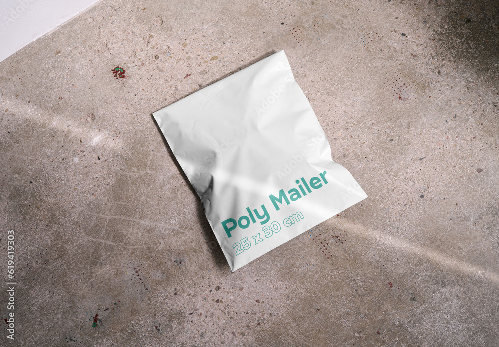 Mockup of customizable poly mailer 25 x 30cm on floor Stock Template ...