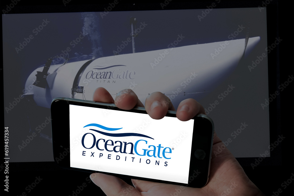 CHENNAI, INDIA 03TH JULY 2023: Ocean Gate logo in holding mobile screen ...