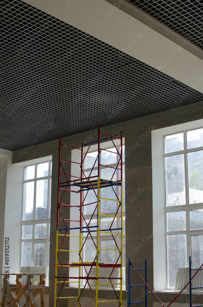 lattice ceiling.suspended ceiling.scaffolding for the installation of a ...
