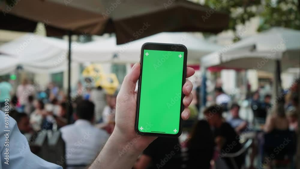 Green Screen chroma key Handheld Smartphone phone with Barcelona city ...