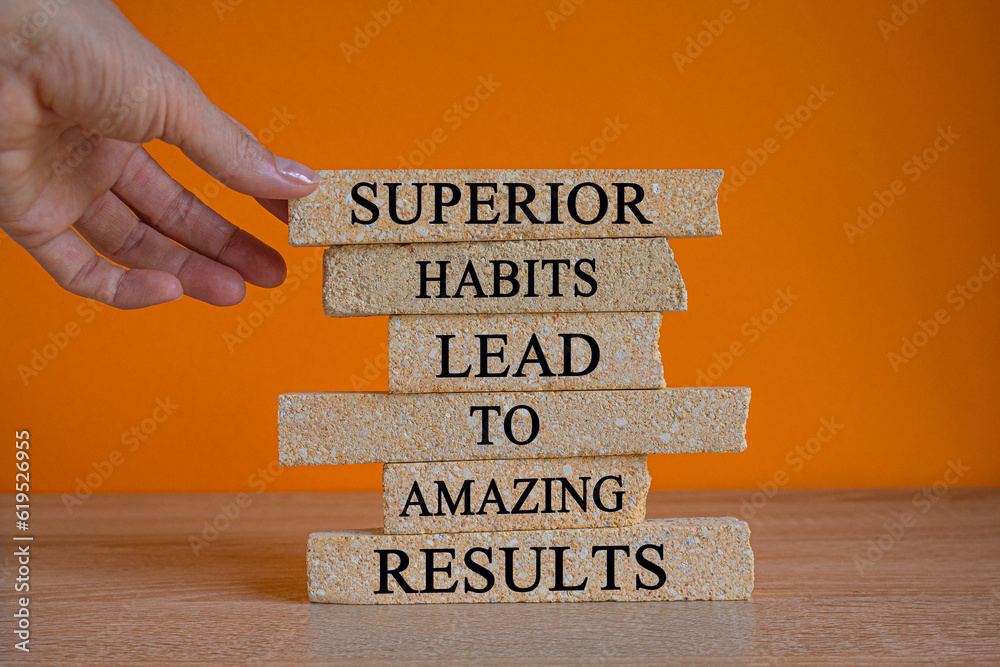 Good habits symbol. Brick blocks with words Superior habits lead to ...