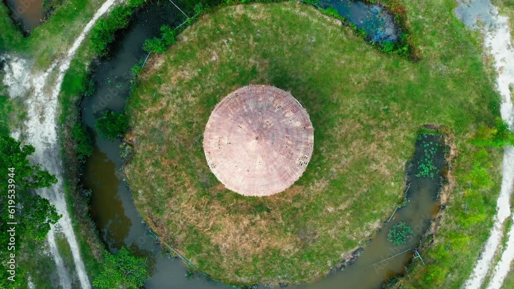 Aerial drone top view luxury thatched bungalow in the bay on a tropical ...