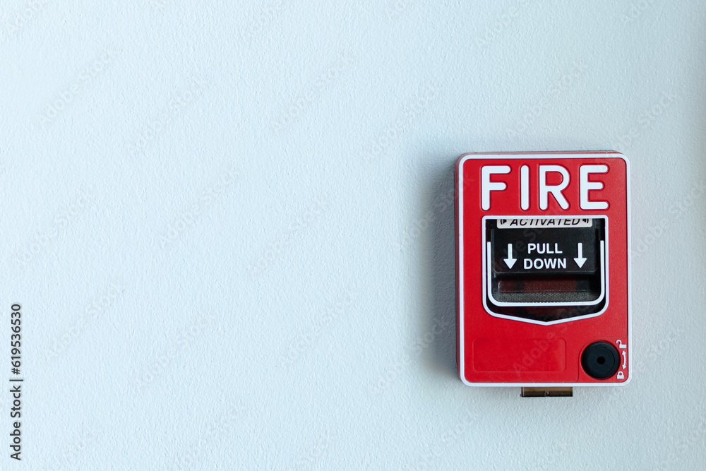 Emergency safety switch alarm red box install on white wall with pull ...