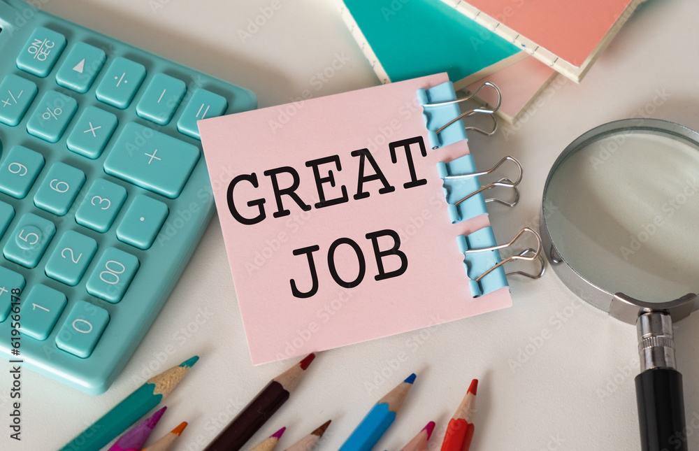 GREAT JOB text on a notebook with calculator on diagram background ...