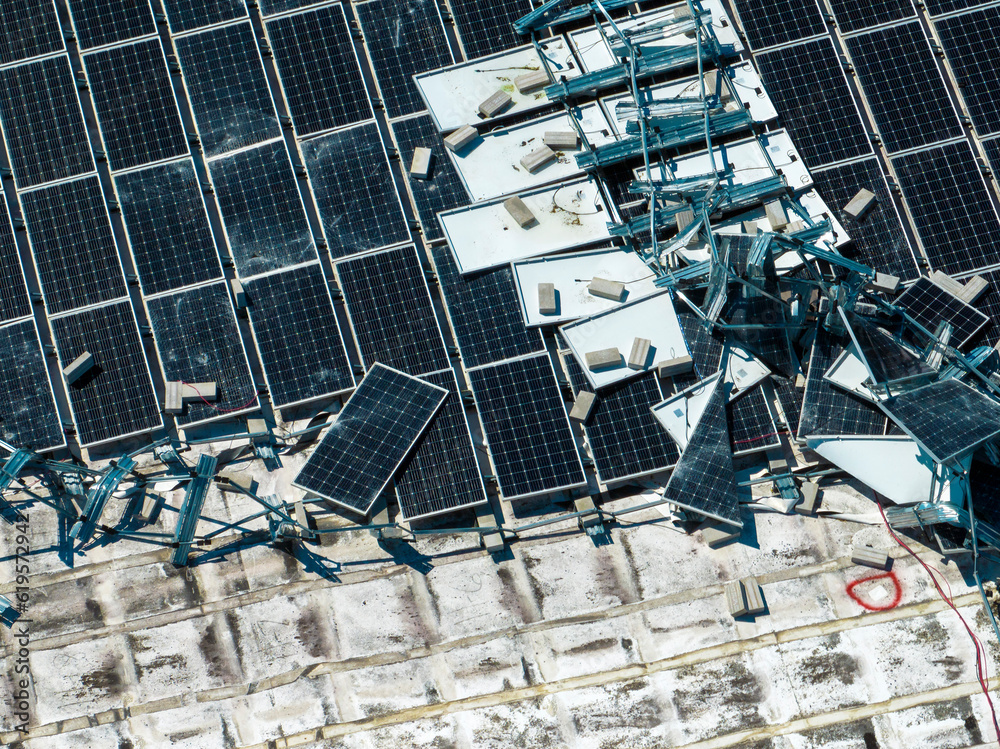 Broken down photovoltaic solar panels destroyed by hurricane Ian winds ...