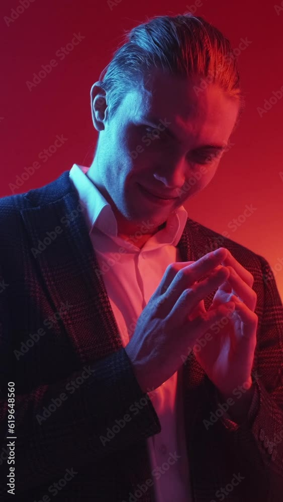 Vertical video. Evil plan. Exciting expectation. Red blue color neon ...