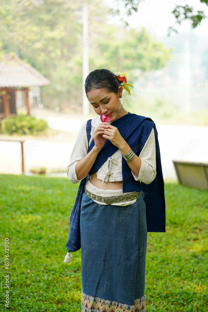 Portrait of Beautiful rural Thai woman wear Thai northern traditional ...