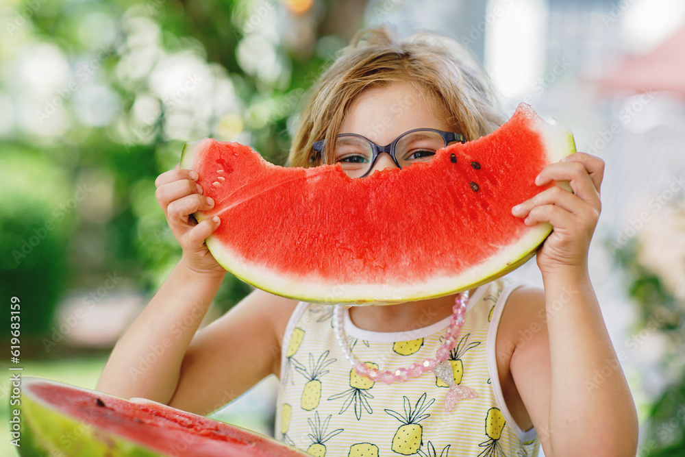 Little Girl, Preschooler, Delights in a Juicy Watermelon on a Sunny ...