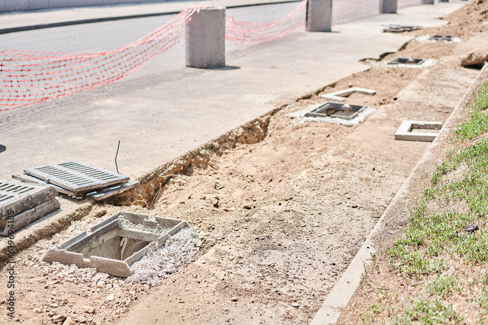 Laying concrete manholes and drain pipes for stormwater system ...