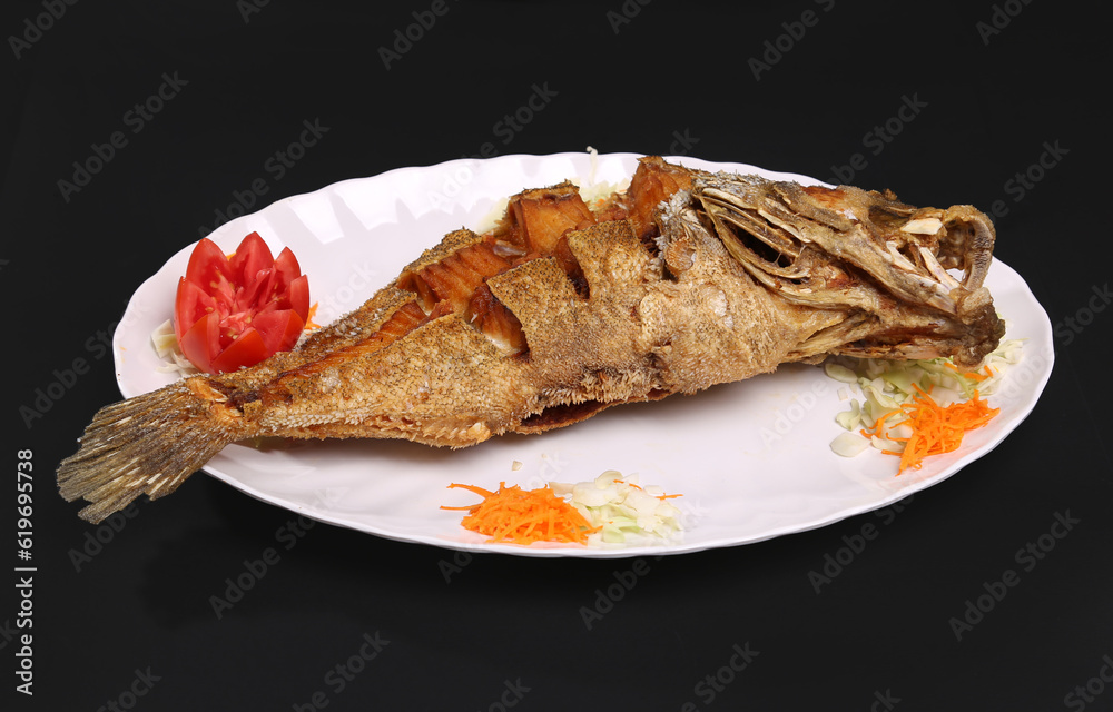 deep fried whole fish fry Arabic style Stock Photo | Adobe Stock