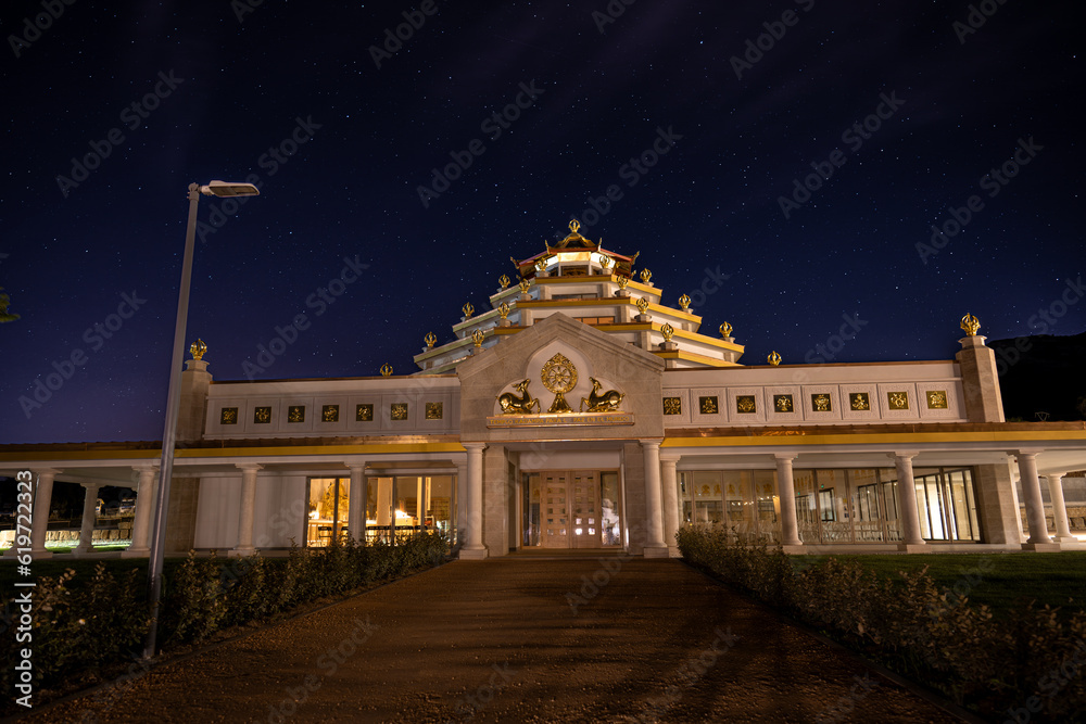 As darkness descends, the temple transforms into a sacred realm of ...