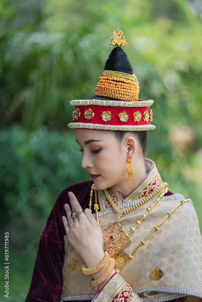 Beautiful Laos girl dressed in ancient luxury national traditional Laos ...