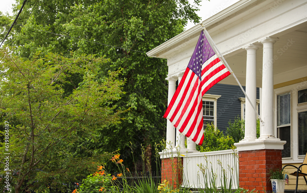 US flag waves proudly on July 4th, symbolizing patriotism and honoring ...