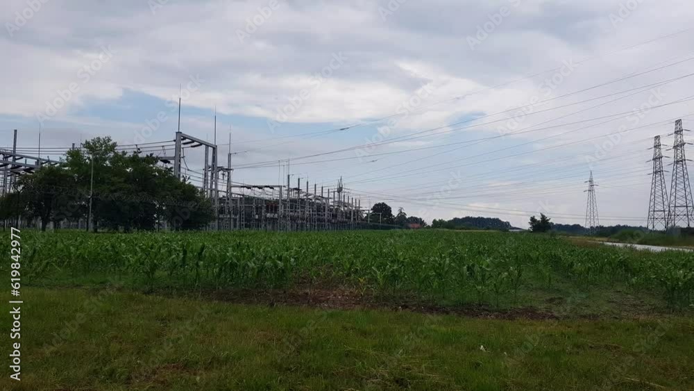 Electric tower with high-voltage cables for long-distance power ...