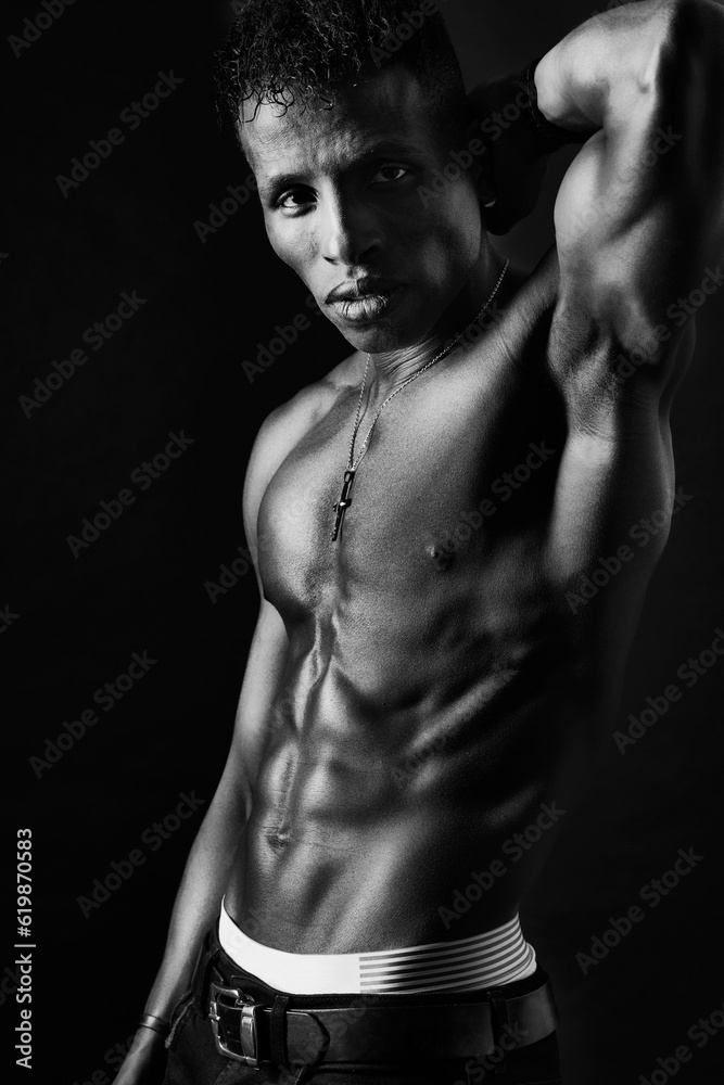 Muscular male model with toned physique. Black or African-American man ...