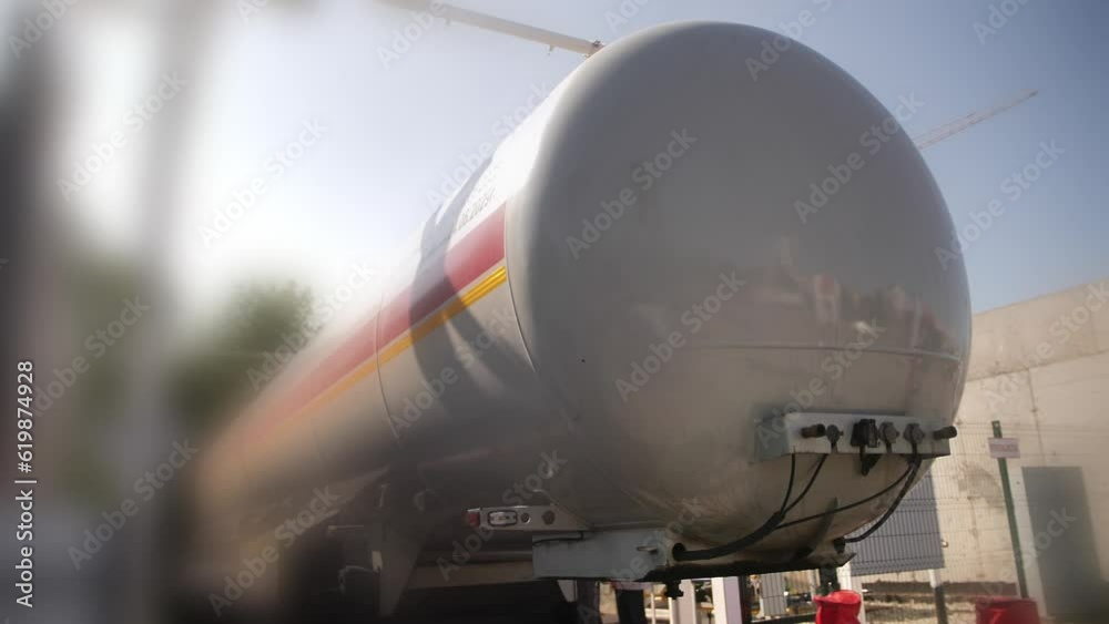 Rear view of trailer tanker truck or fuel tank transporting oil or ...