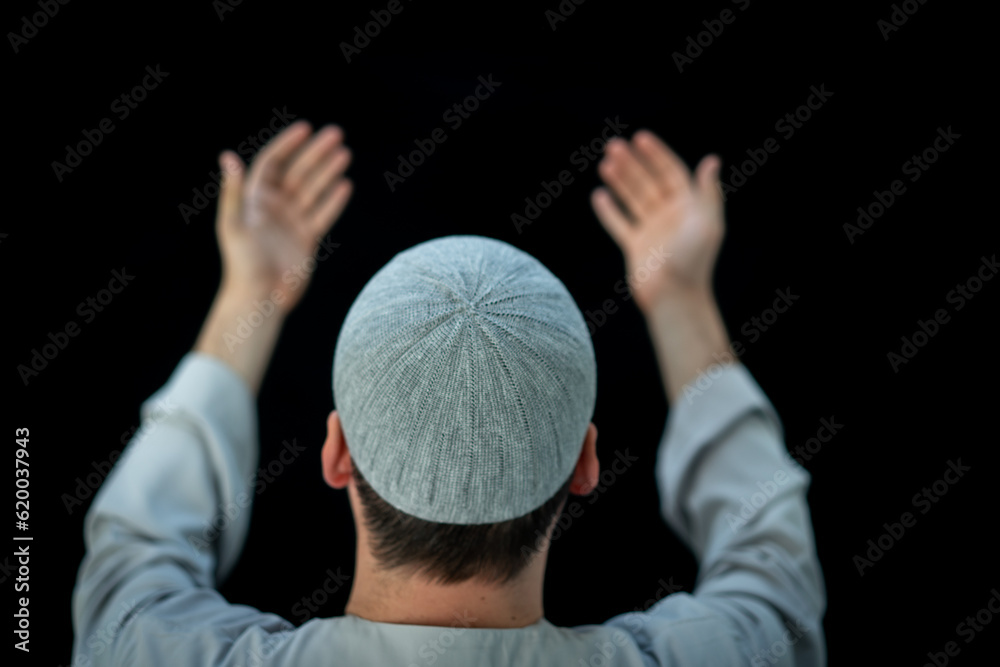 Muslim man standing and praying in the front of Kaaba in Mecca, KSA ...
