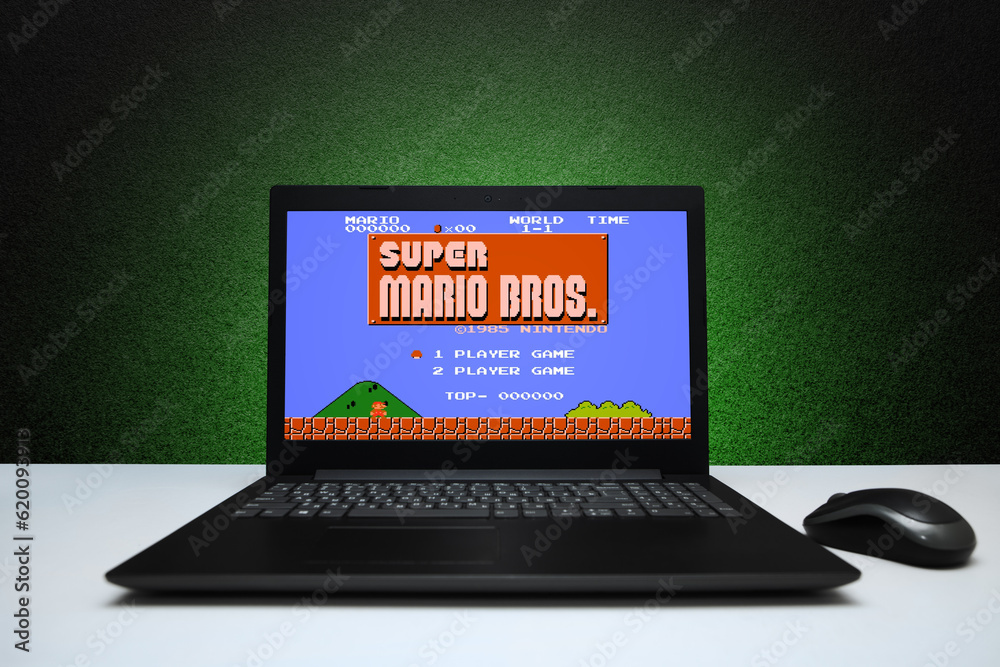 Super Mario Bros classic video game on the screen laptop computer with ...