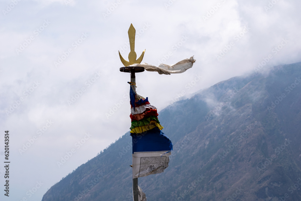 Multi color budhhist prayer flag flowing with the wind. Buddhist prayer ...