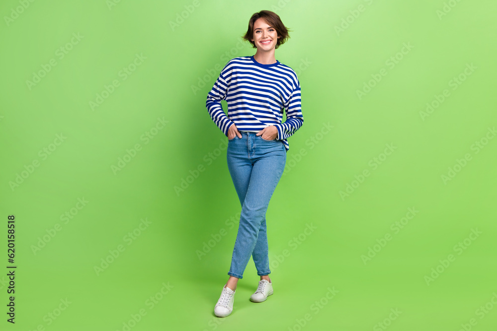 Full size photo of cheerful girl dressed striped sweatshirt standing ...