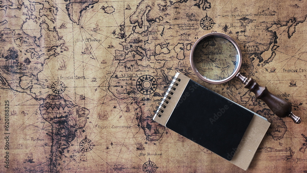 Magnifying glass and an ancient old map,Old map with an magnifying ...