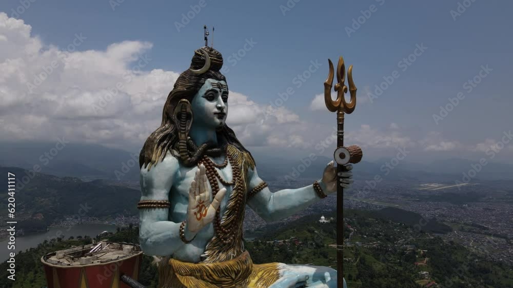 Aerial view of the big statue of Lord Shiva in Nepal. Drone flight with ...