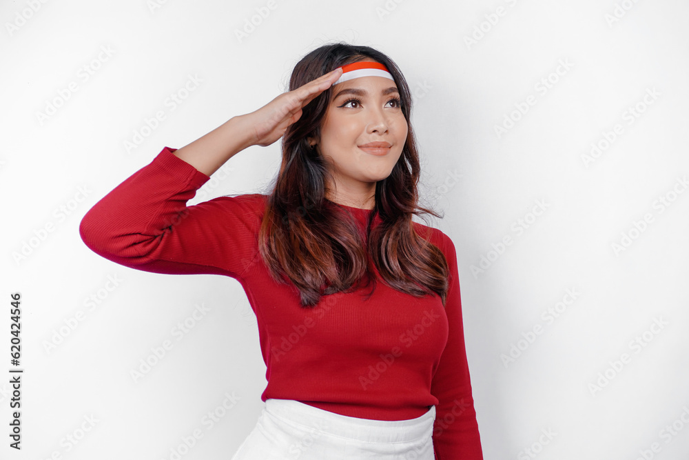 Beautiful Asian woman giving salute celebrate Indonesian independence ...