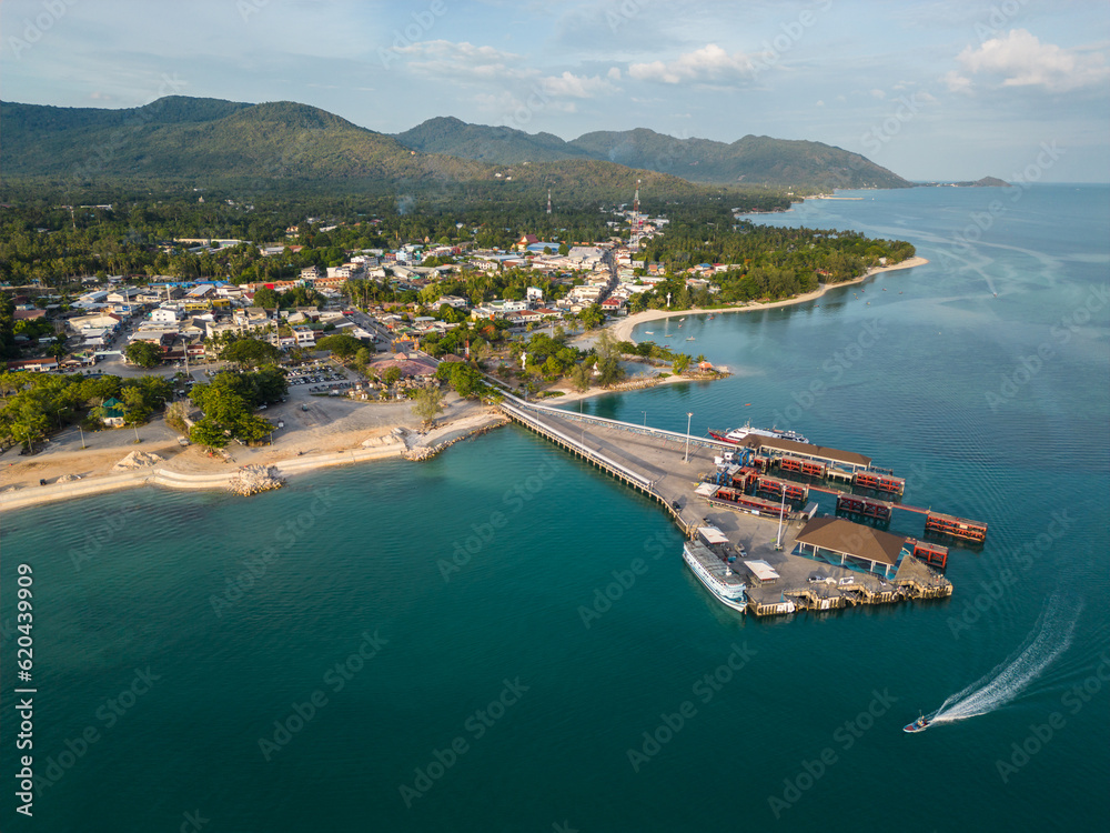 Ko Pha Ngan, Thailand: Aerial panorama of the Thong Sala ferry harbor and town in the Ko Phangan ...