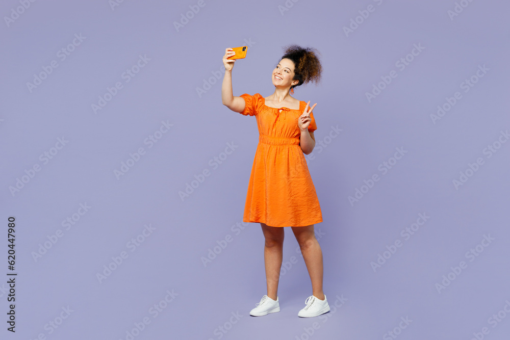 Full body young latin woman she wear orange blouse casual clothes doing ...