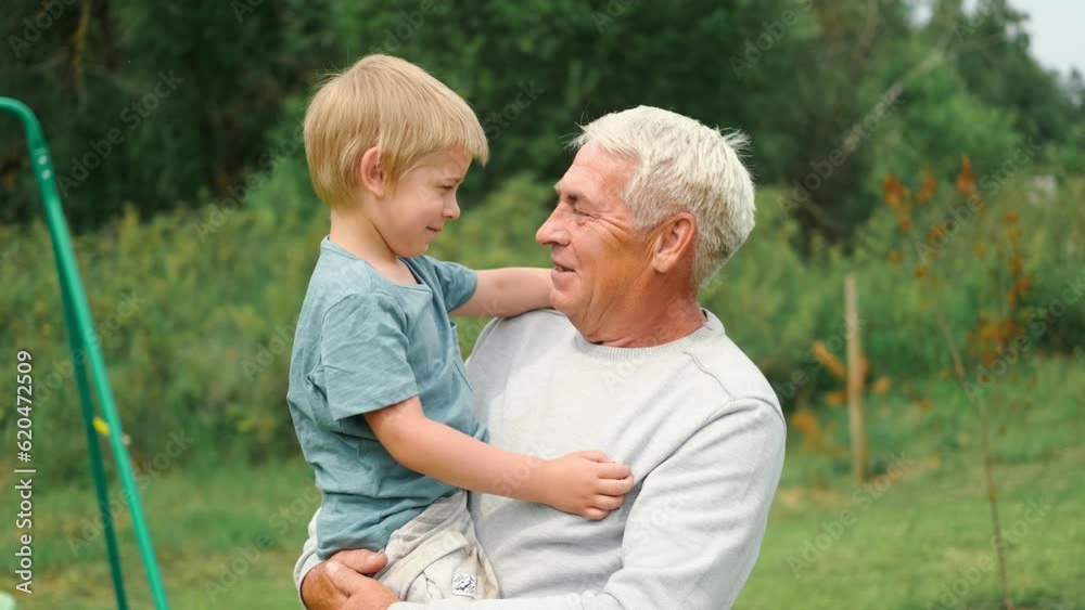 Grandfather and grandchild baby have fun during walk In Park. Happy ...