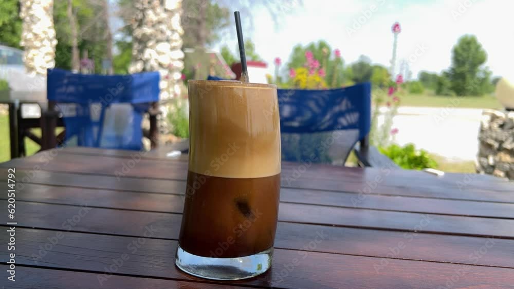 Close-up of freshly made Greek Frappe. Nescafe Frappe. Greek iced ...