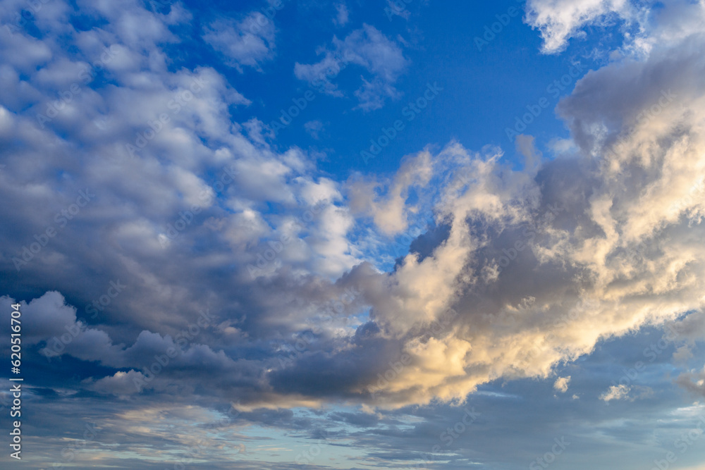 White clouds on a summer blue sky in cartoon style for background or ...