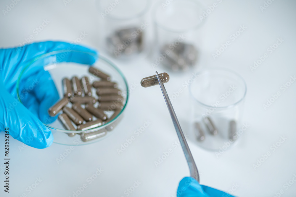 Medical innovation as a scientist meticulously prepares fecal ...