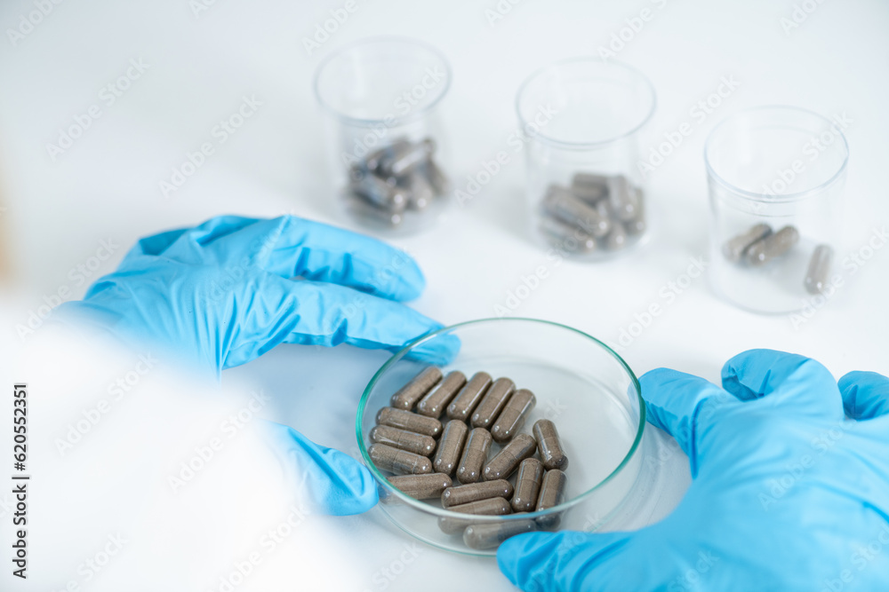 Medical innovation as a scientist meticulously prepares fecal ...