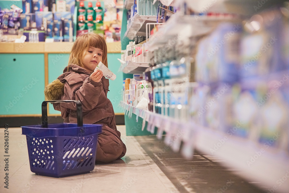 charming child shopping in a supermarket in Denmark Stock Photo | Adobe ...