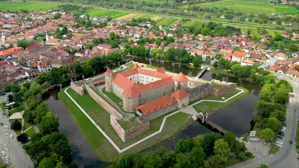 Cinematic aerial perspective of Fagaras city, with Fagaras Fortress in ...