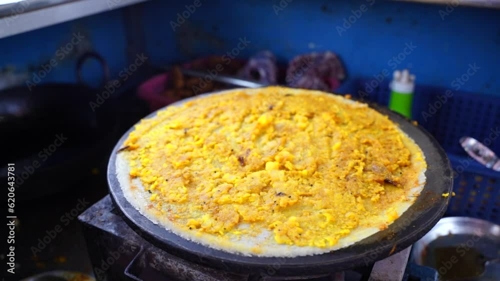 This is a closeup shot of Masala Dosa, one of the most famous Indian ...