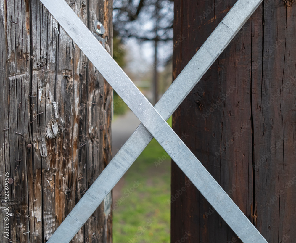 Stock image of metal brace between telephone poles Stock Photo | Adobe ...